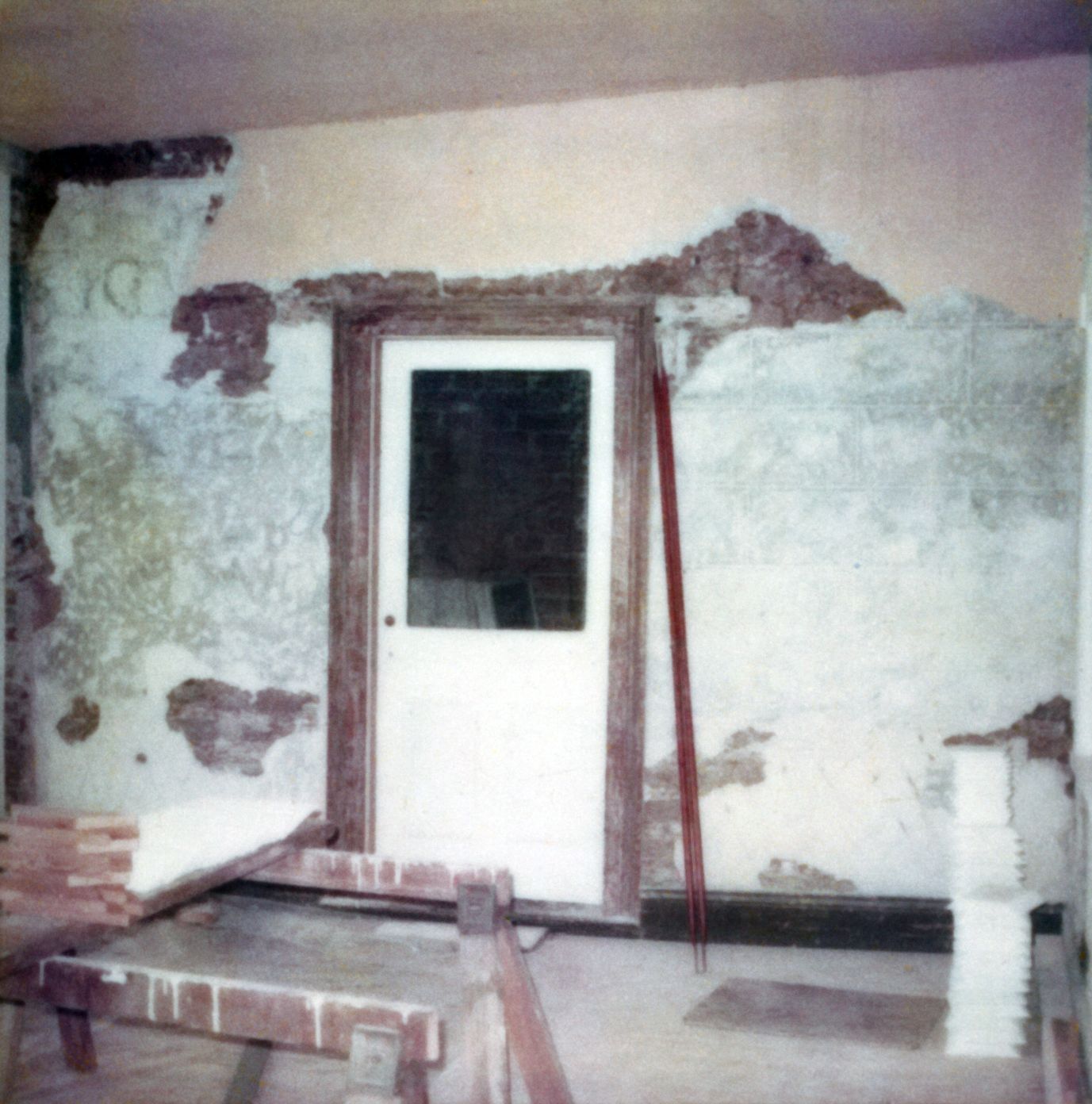 EAST DOOR, NORTH PORCH OF THE WORKMAN HOUSE DURING PLASTER STRIPPING