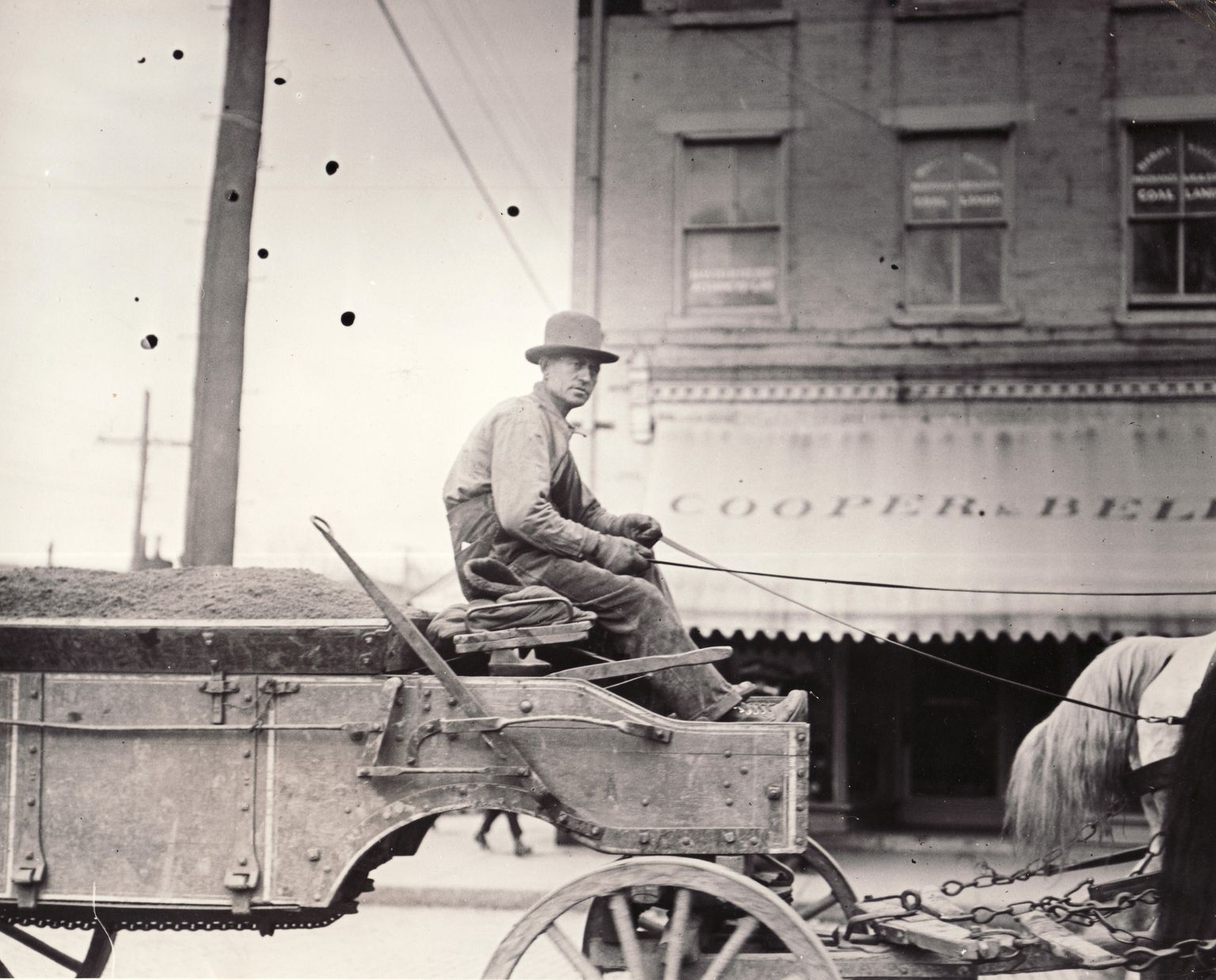 George "Chip" Strosnider traveling east on High Street in front of the ...