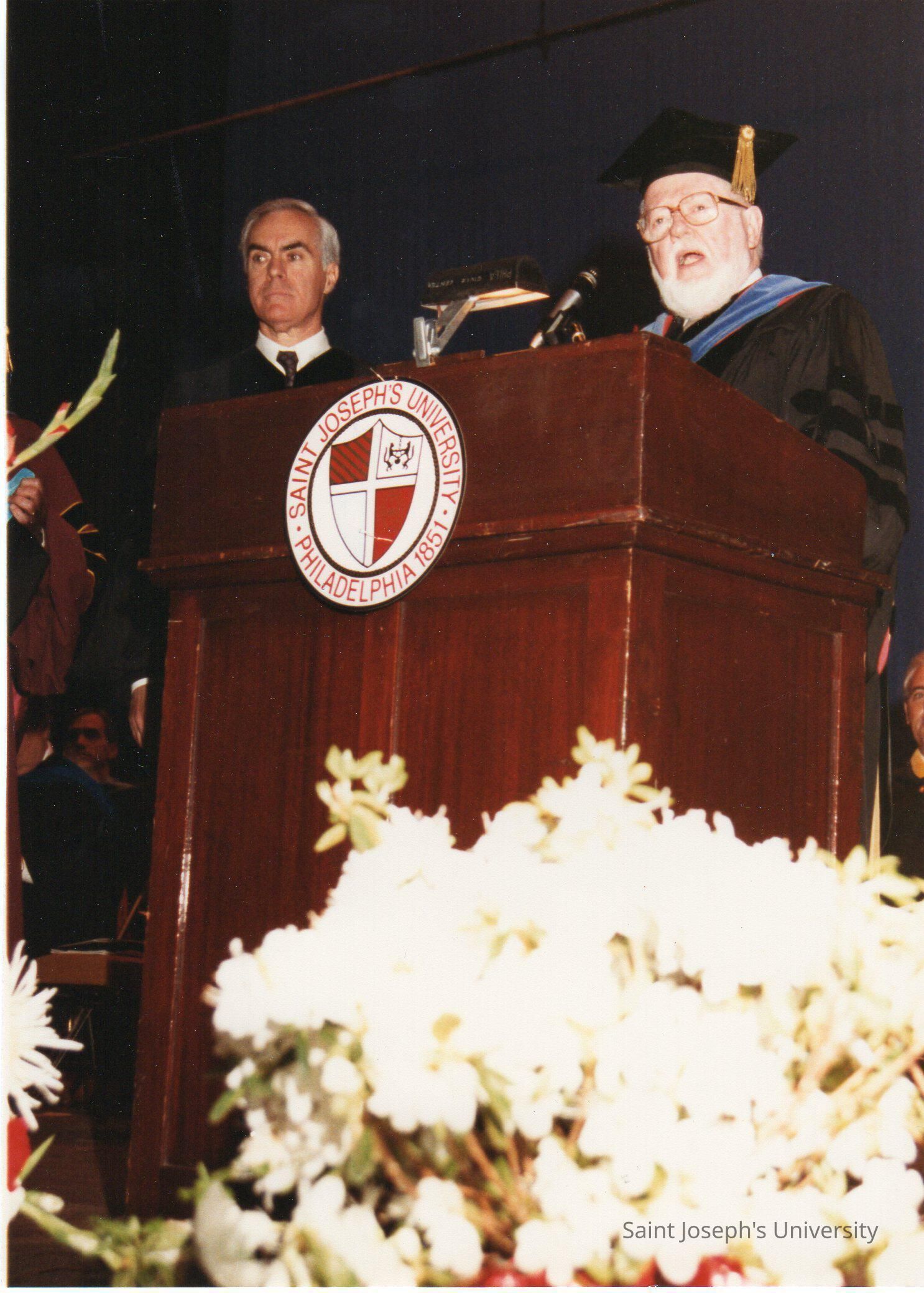 James E. Dougherty reading honorary degree citation to Robert P. Casey ...