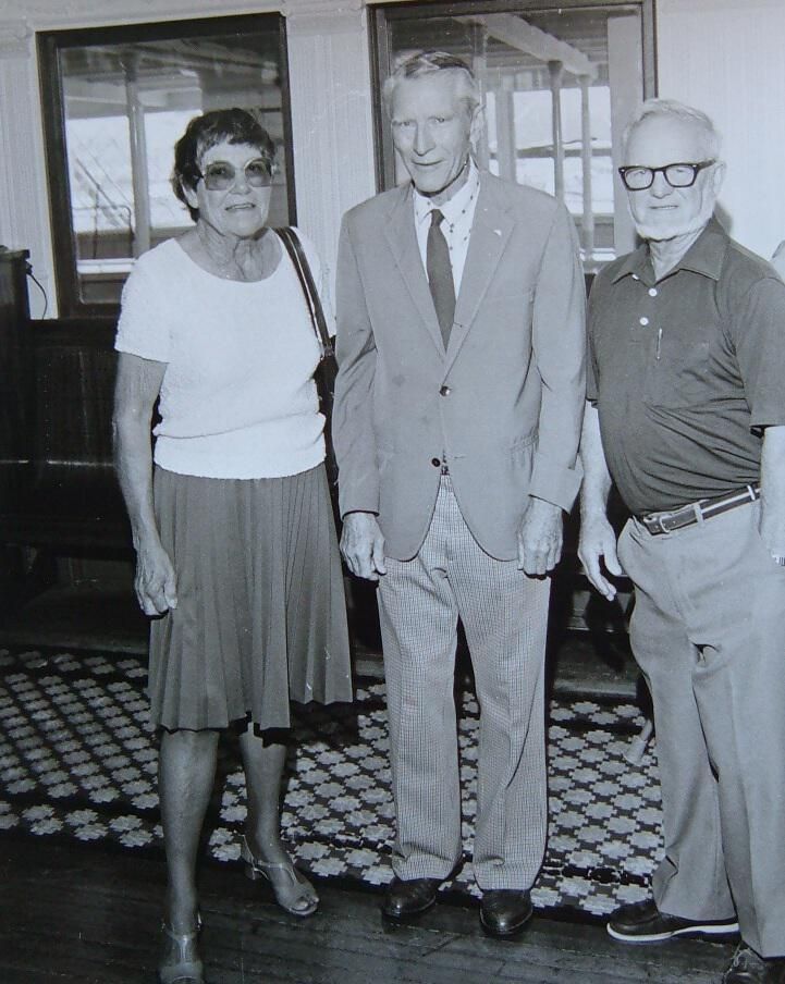 Capt. Edward Frederick with unidentified couple