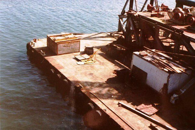 Intrepid Endeavor, port bow and deck house of floating crane barge