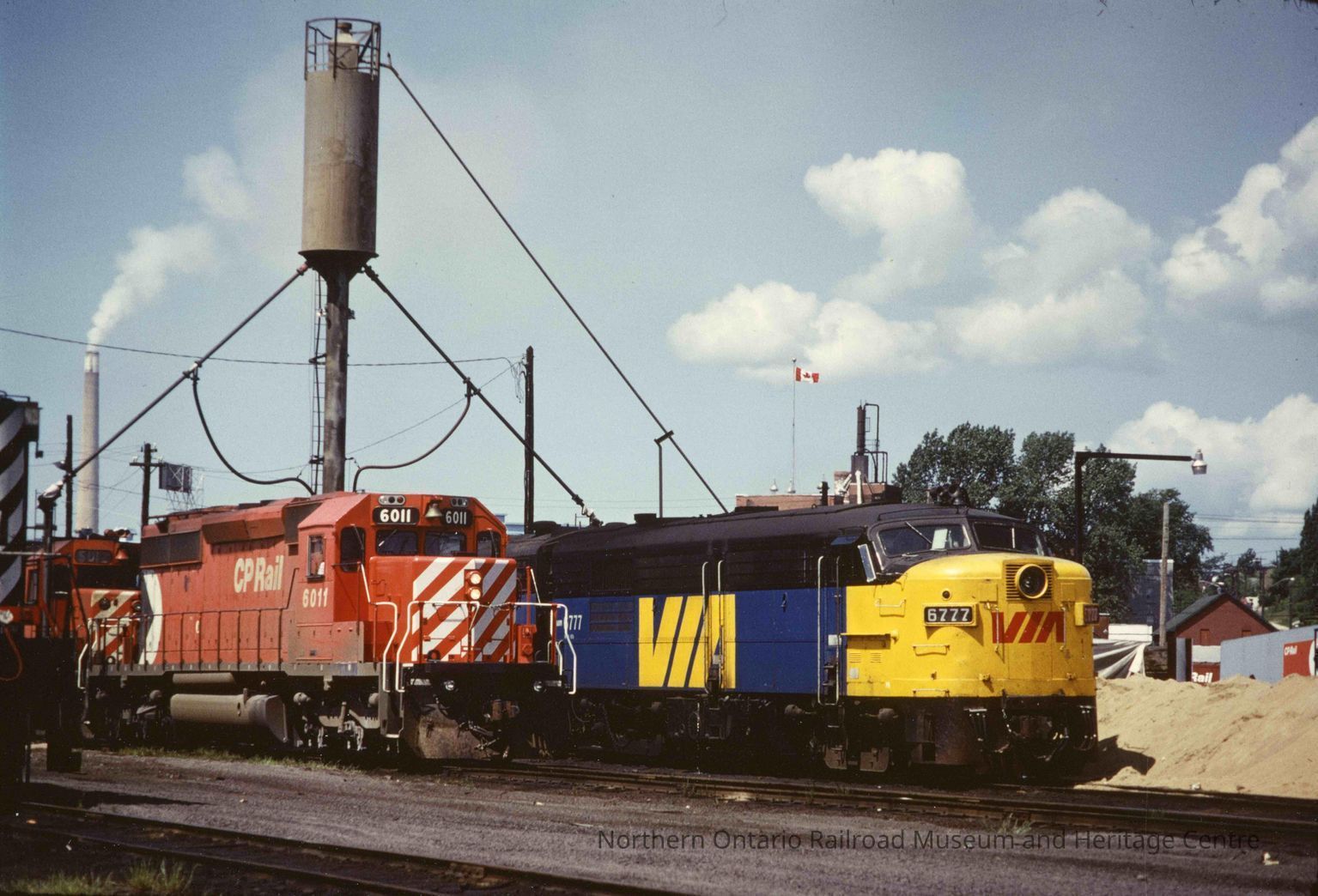 Photograph, VIA Rail Engine 6772 and CP Engine 6011.