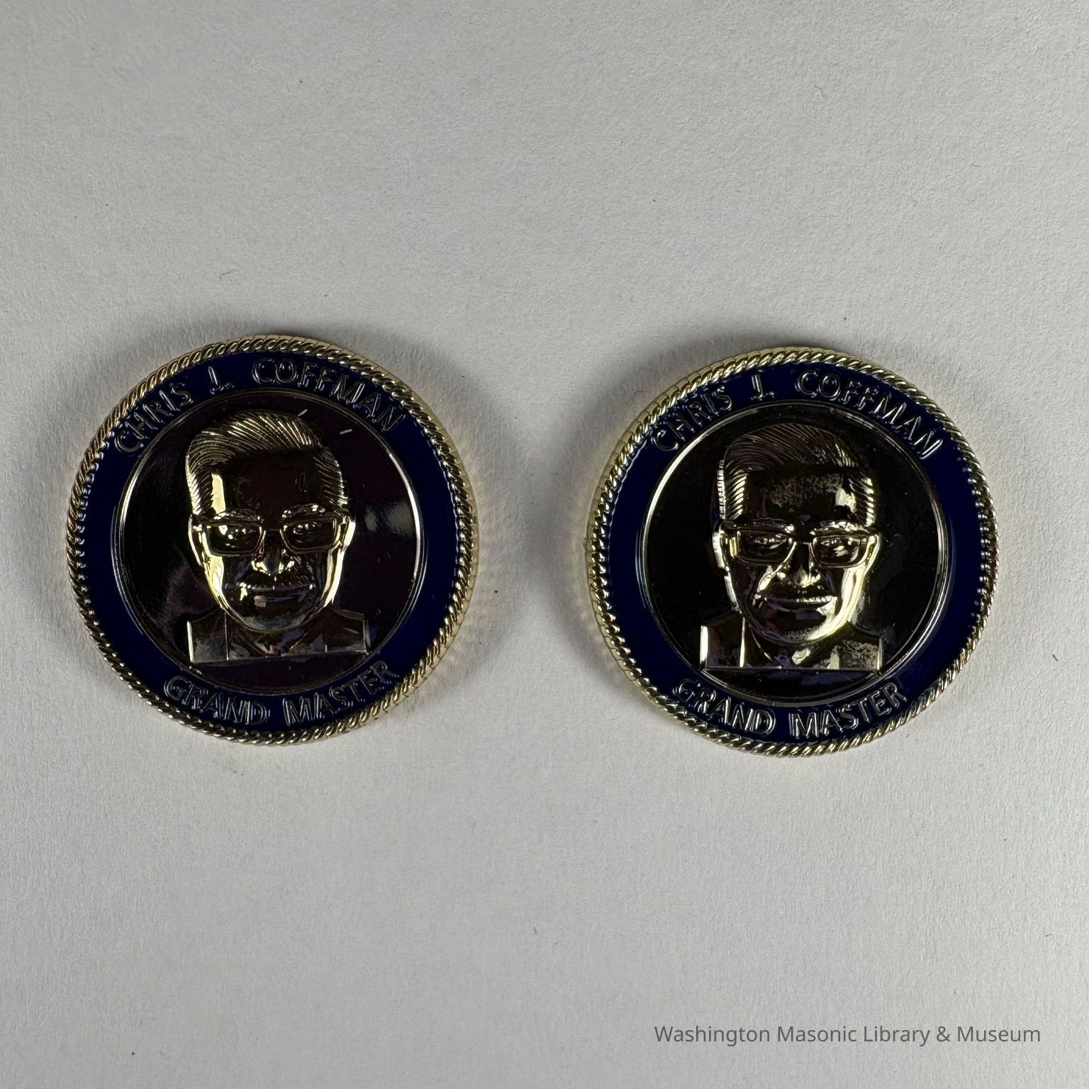 2 Coins: Gold and Blue. Past Grand Master Chris J. Coffman (2020-2021).