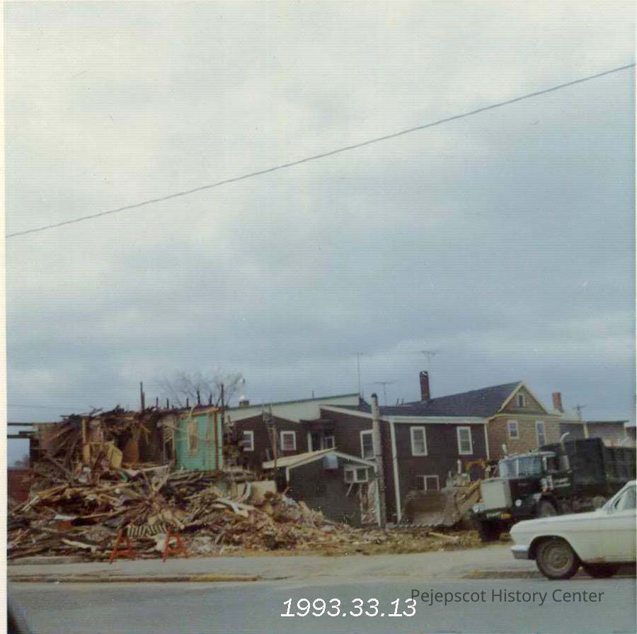 A photo of Mike's Lounge being razed. 3/1973